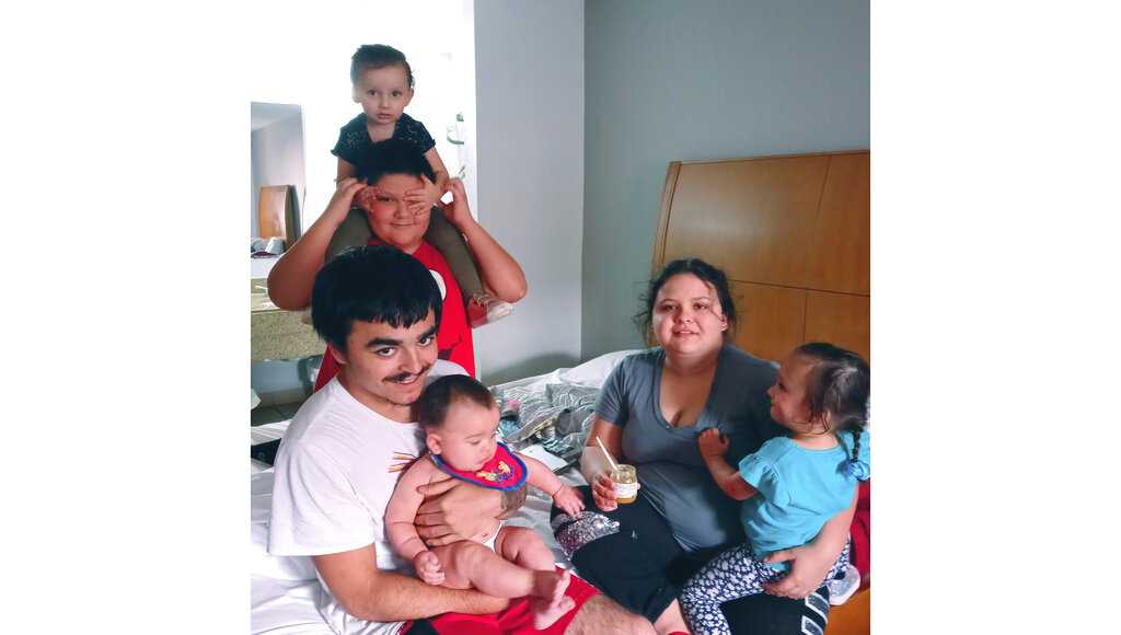 'I'm trying to stay calm, especially around the kids': Family displaced ...