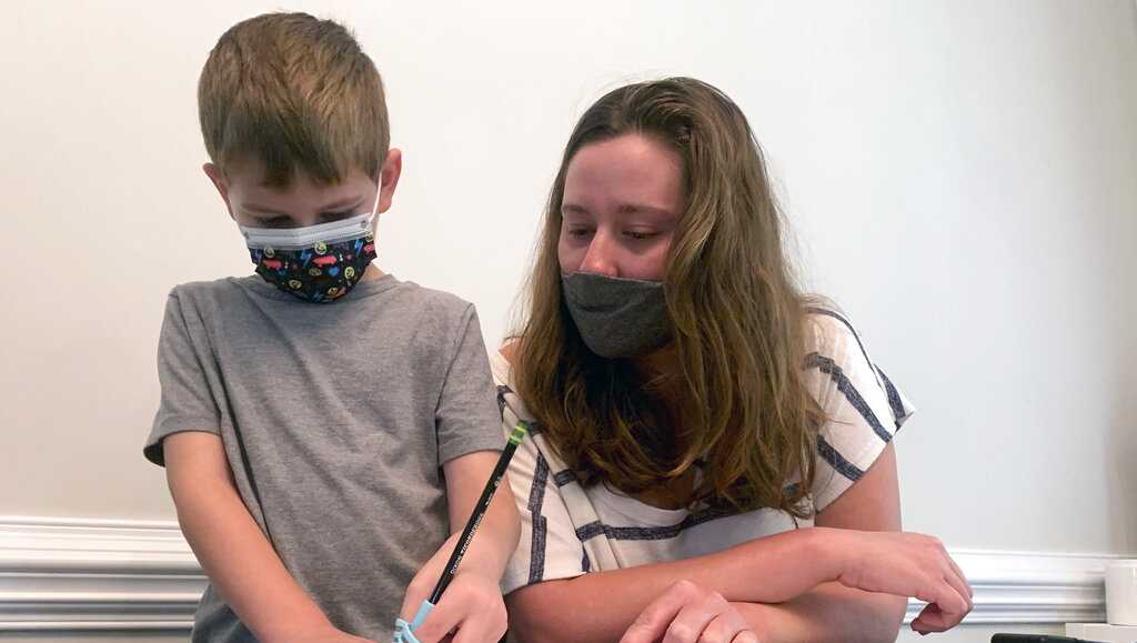 School COVID-19 outbreaks have stranded some students at home with ...