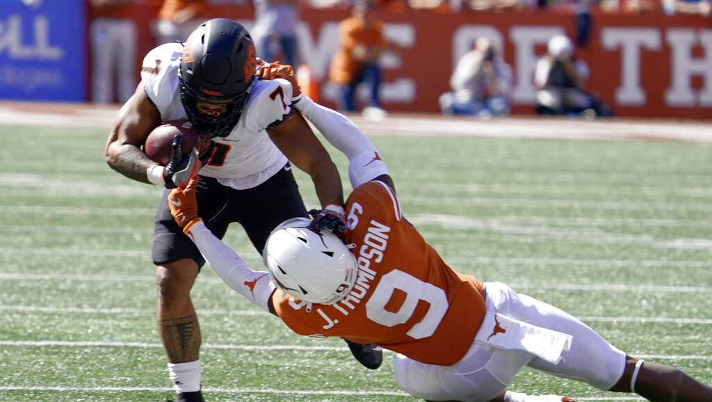 No. 12 Oklahoma State rallies late to beat No. 25 Texas 32-24