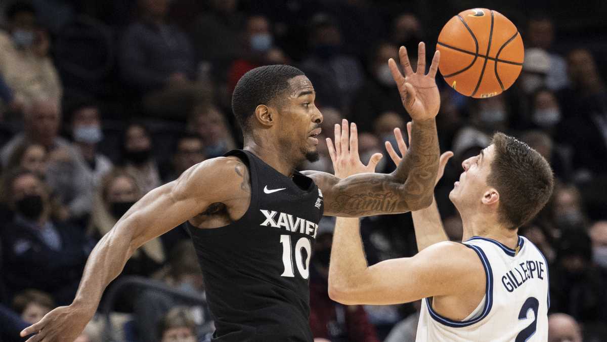Moore, Daniels lead No. 23 Villanova past No. 18 Xavier