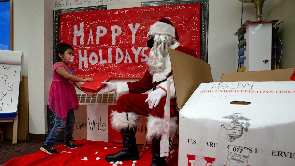 Marines on snowmobiles help Santa deliver presents in Alaska's remote ...