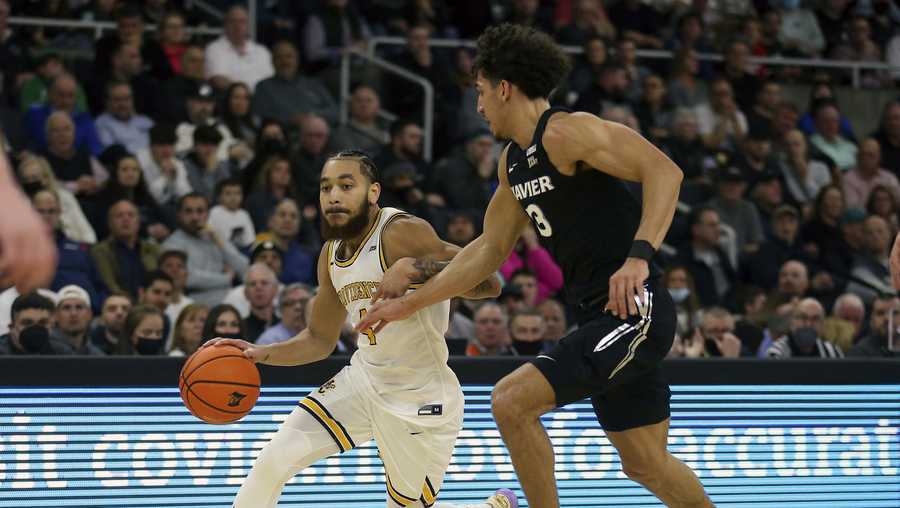 Bynum's 27 points lift No. 11 Friars over Xavier in 3 OTs
