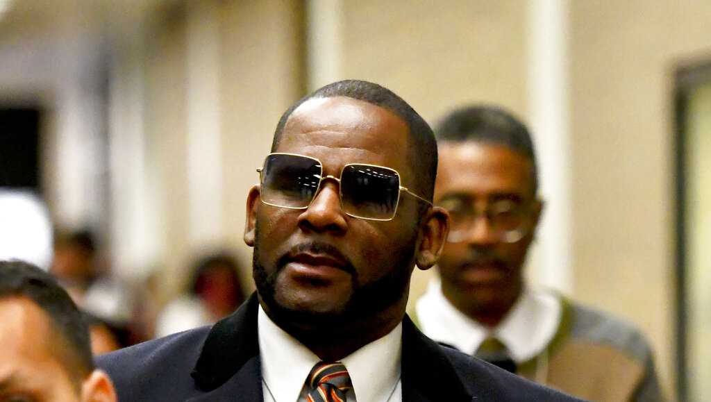 R. Kelly convicted on several child pornography charges, acquitted of ...