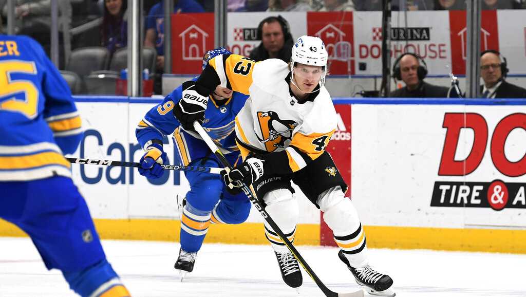 Rust's overtime goal lifts Penguins to 3-2 win over Blues