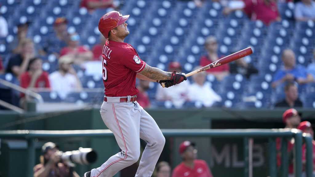 Senzel saves run in 9th, homers leading off 10th and Reds beat ...