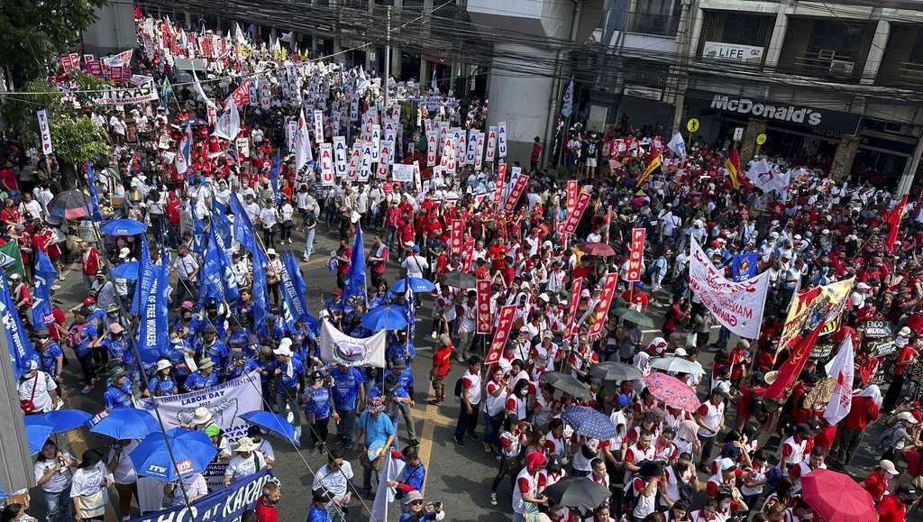 On May Day, workers rally for better labor conditions