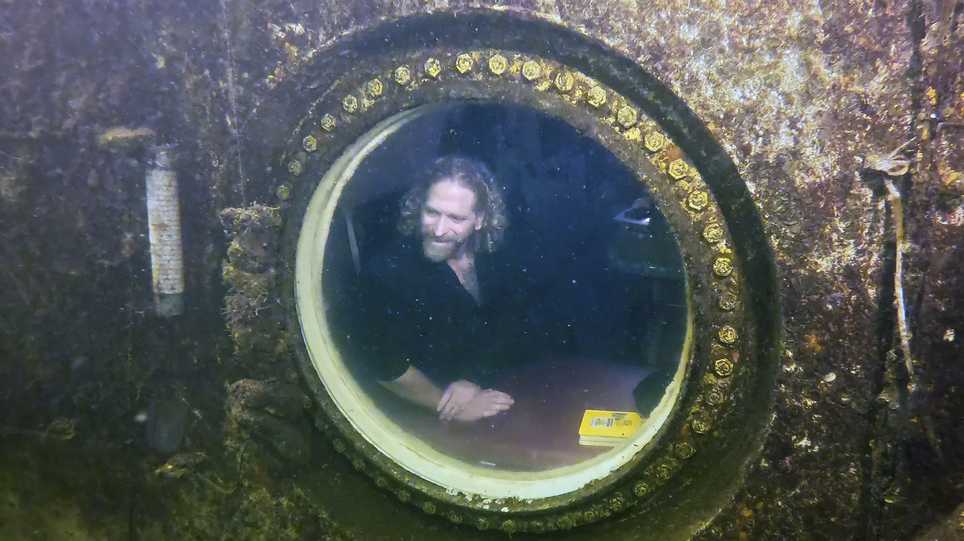 Florida man sets record for living underwater