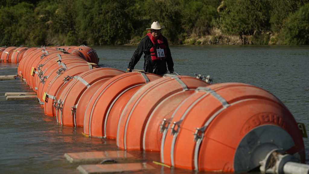 Judge orders Texas to move floating barrier from US-Mexico border