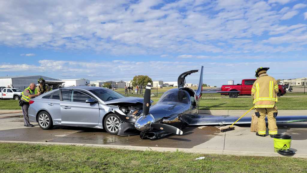 Video: Small plane crashes into car during emergency landing