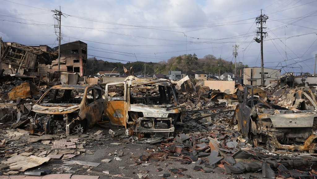 Survivors Are Found In Homes Smashed By Japan Quake That Killed 94