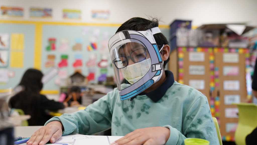 The CDC has relaxed COVID guidelines. Will schools follow suit?