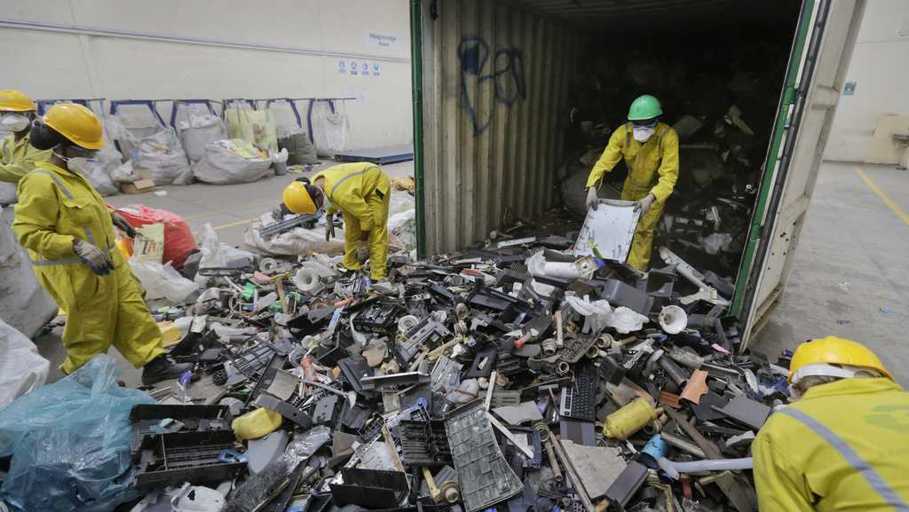 E-waste from trashed electric devices is piling up and recycling isn't ...