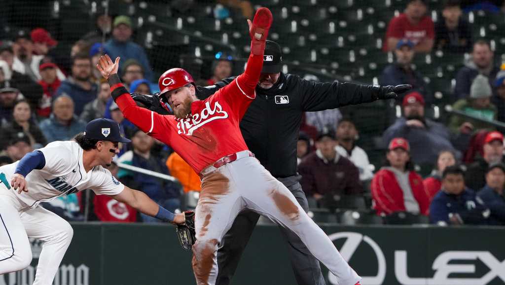 Mariners power over Reds, 9-3, in series opener