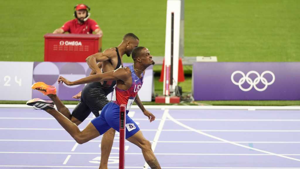 Quincy Hall wins men's 400-meter gold in comeback race
