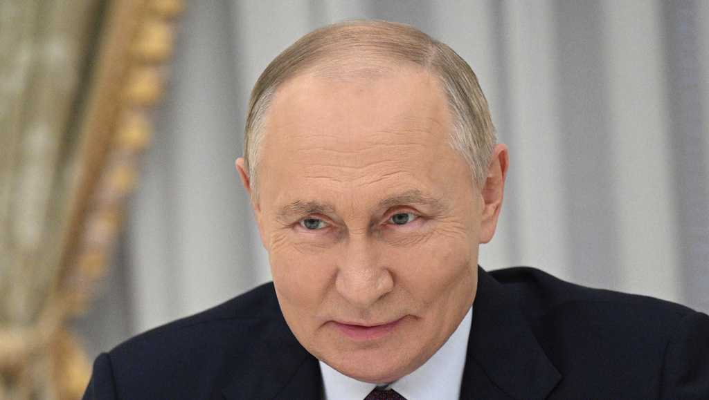Putin lowers threshold of nuclear response as he issues new warnings to the West over Ukraine