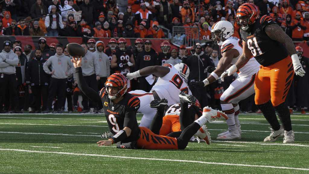 WATCH: Joe Burrow makes unreal throw to Higgins for first touchdown ...