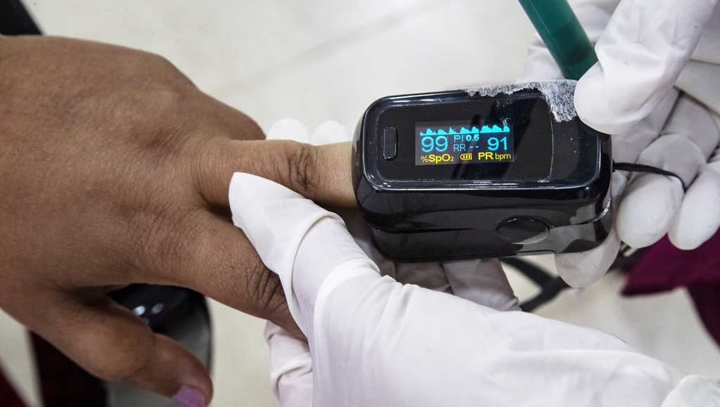 Pulse oximeters may misread oxygen levels in people of color. The FDA ...