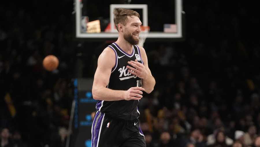 Sabonis grabs 22 rebounds in another triple-double as Kings beat Nets 110-93