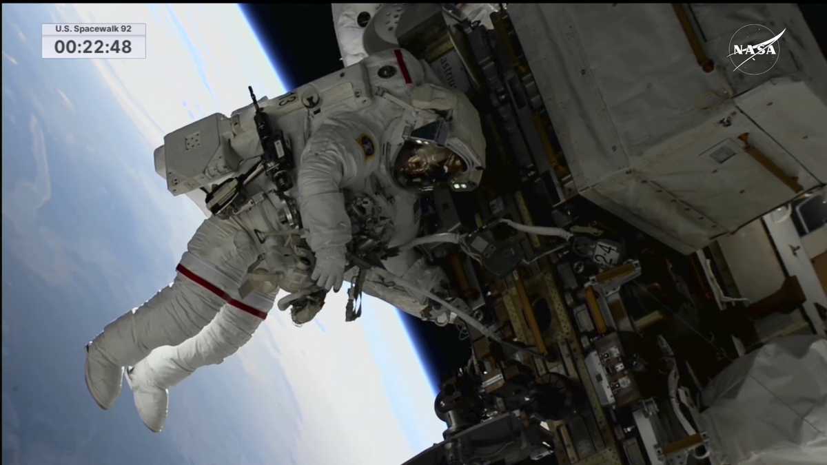 NASA's 2 stuck astronauts take their first spacewalk together