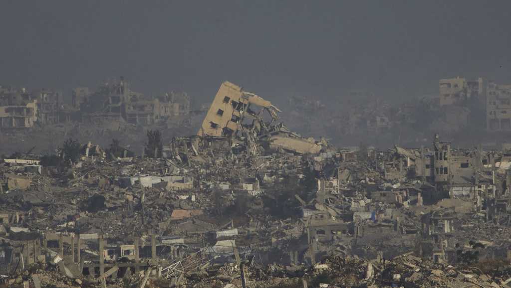 Israeli strikes kill 52 in Gaza, including 36 in school shelter bombing