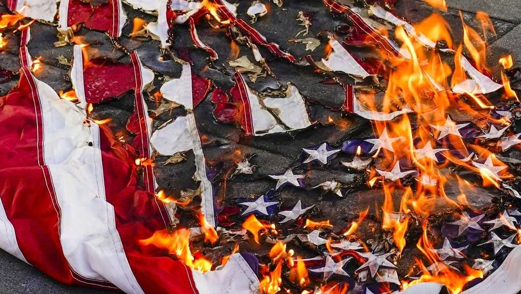 Trump signs executive order on flag burning