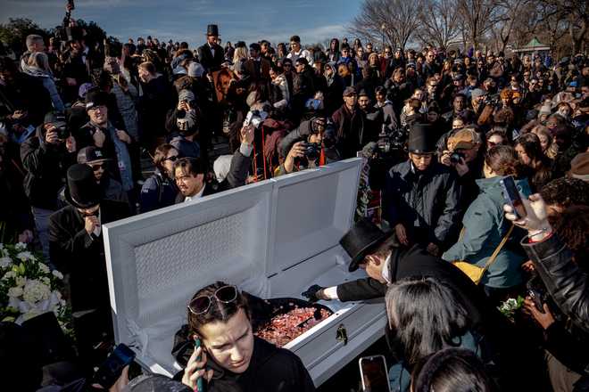 Hundreds attend mock funeral for the penny at the Lincoln Memorial