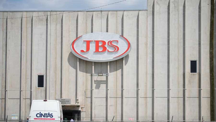 Workers on strike at one of the largest meatpacking plants in US