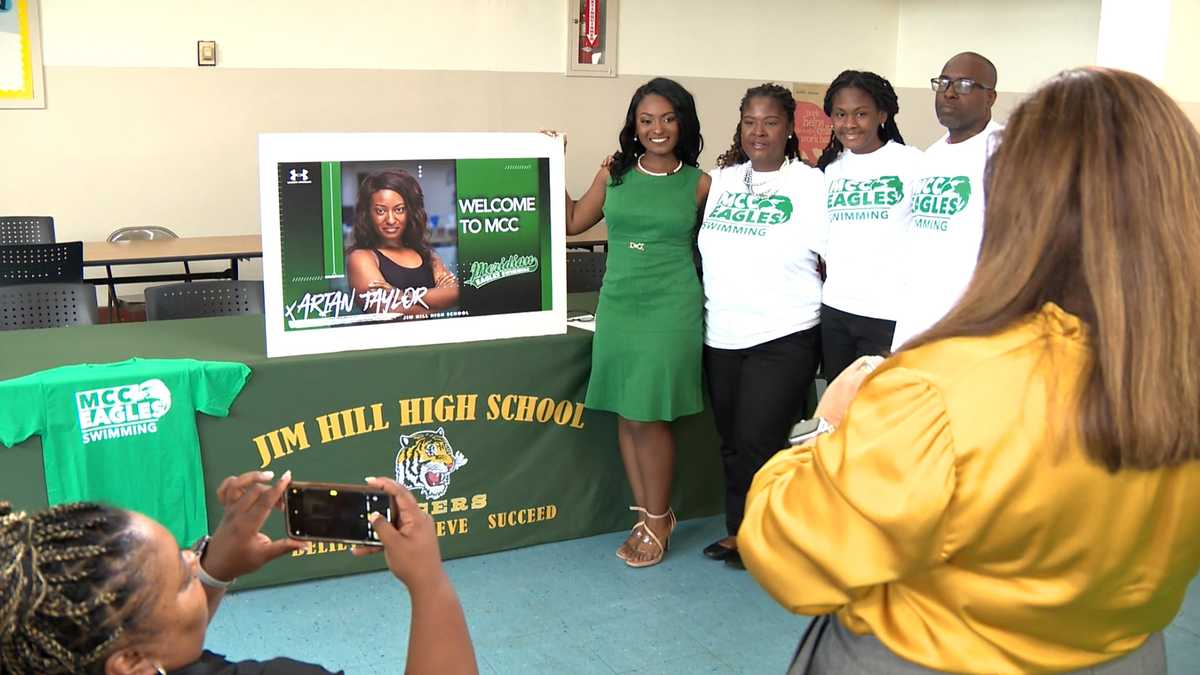 Jim Hill swimmer makes history with signing
