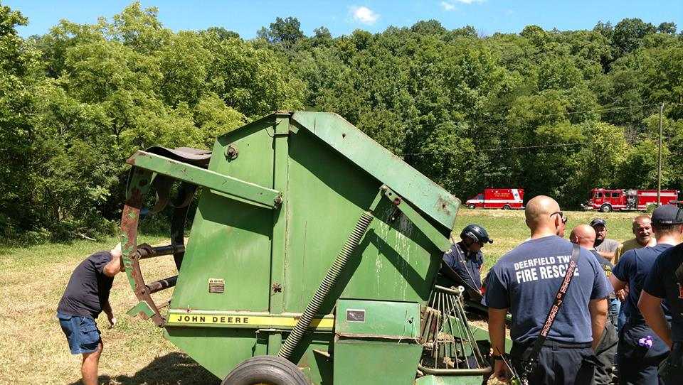 Crews rescue victim after arm gets stuck in farm baler in Warren County