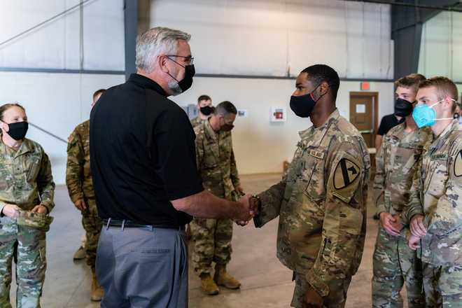 Indiana Gov. Holcomb visits Camp Atterbury to welcome Afghanistan evacuees