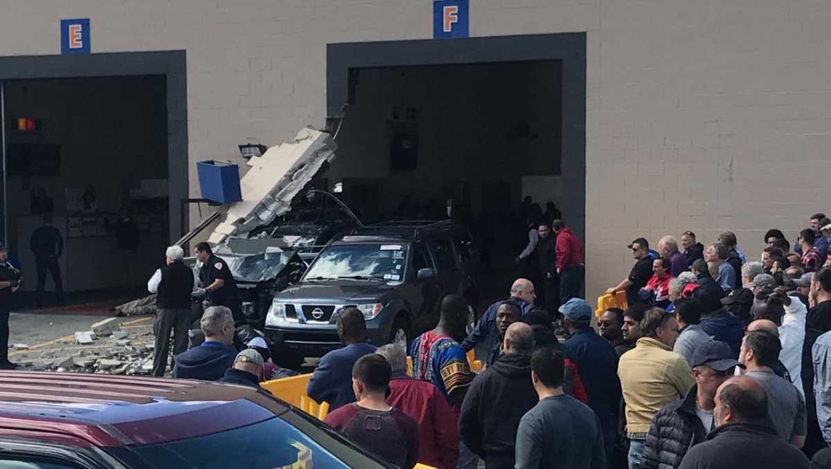 Images: Multiple people killed in auto auction crash