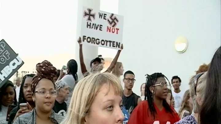 Protesters met with pepper spray at political debate
