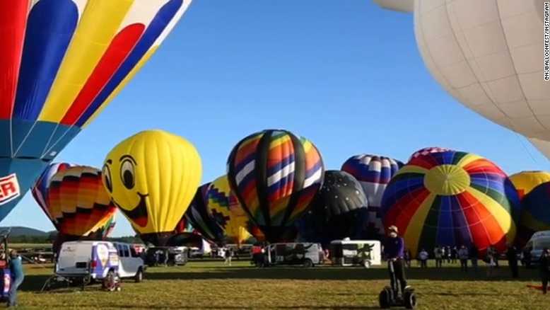 Balloons fill sky at America's largest summer balloon/music fest