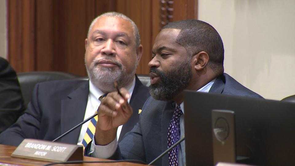 Board OKs school redevelopment plan after contentious exchange