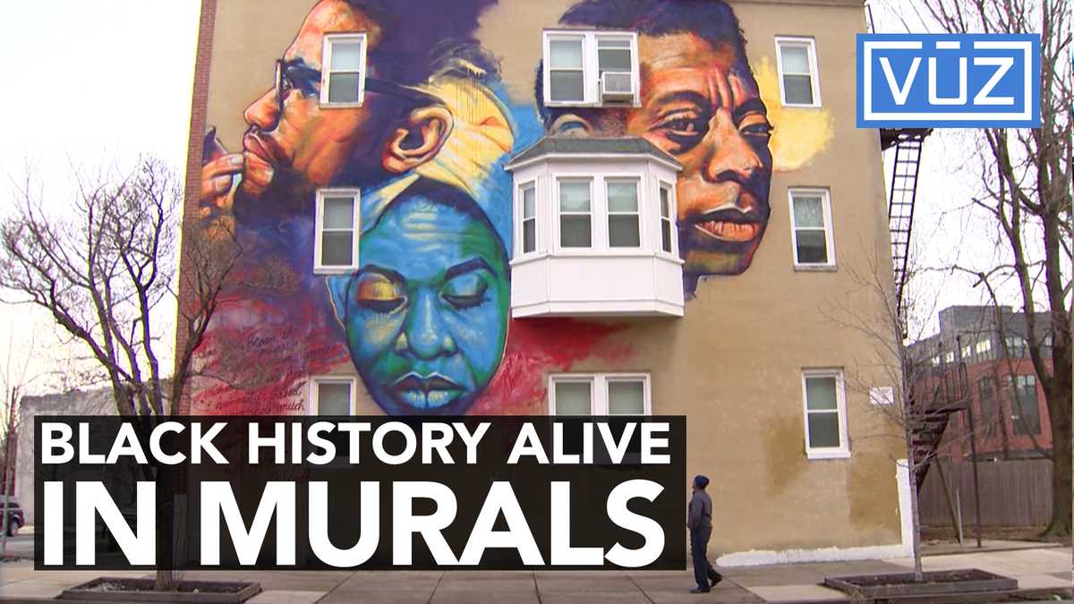 One muralist uses the city of Baltimore as his canvas