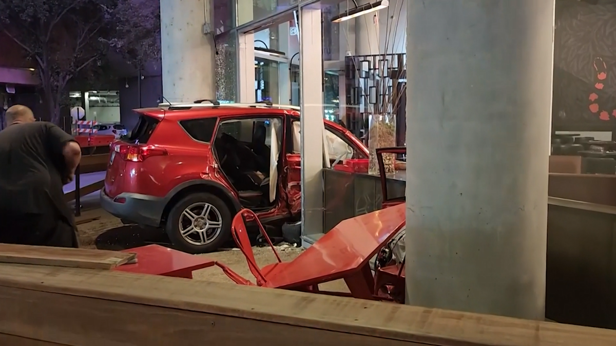Police: 3 hospitalized after car crashes into window of downtown ...