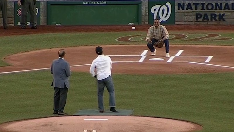 Injured Capitol Police officer throws out first pitch in emotional moment