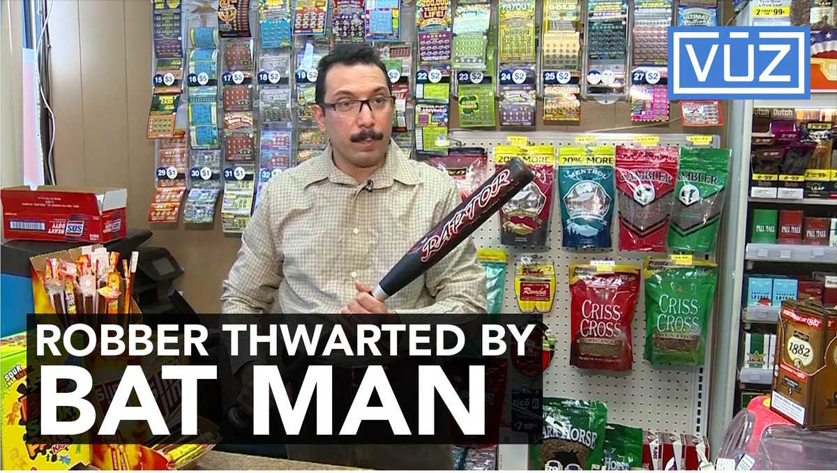 Convenience store owner used bat to fight off a robber