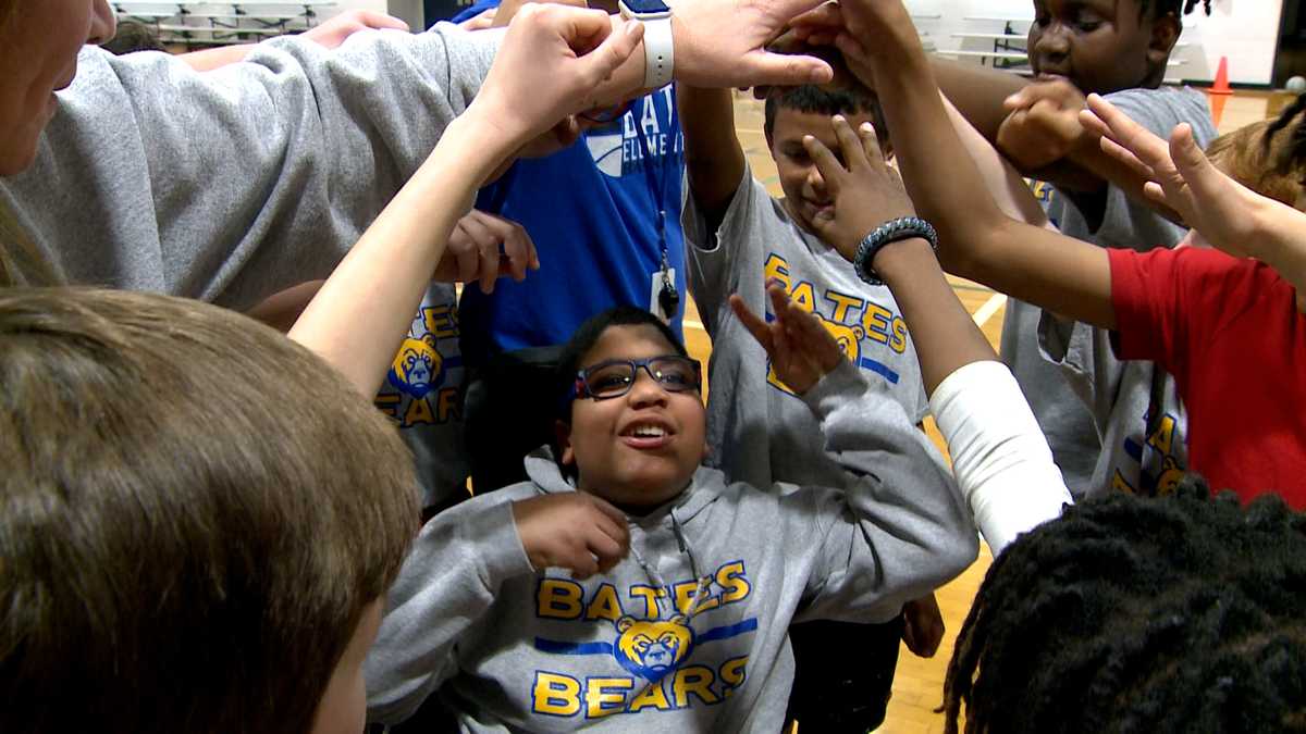 Bates Elementary School basketball player with cerebral palsy serving ...