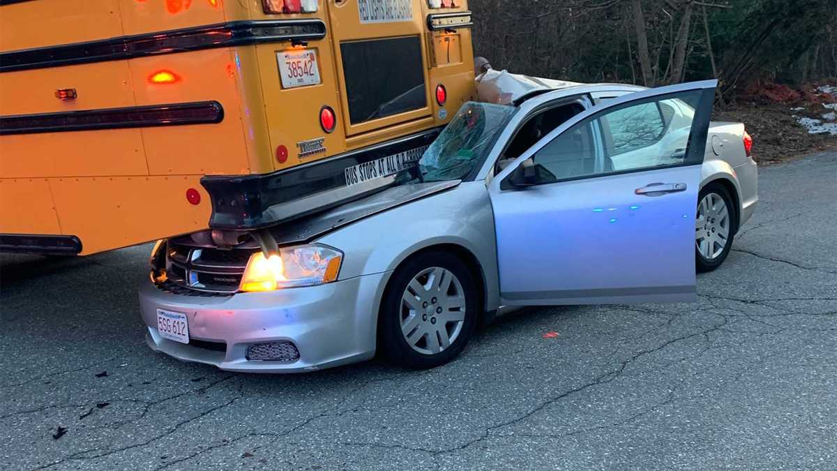 Car wedged underneath school bus in Bedford crash; 2 students hurt