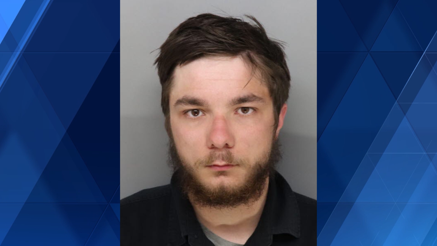 Court docs: Man charged after shooting gun from inside public restroom