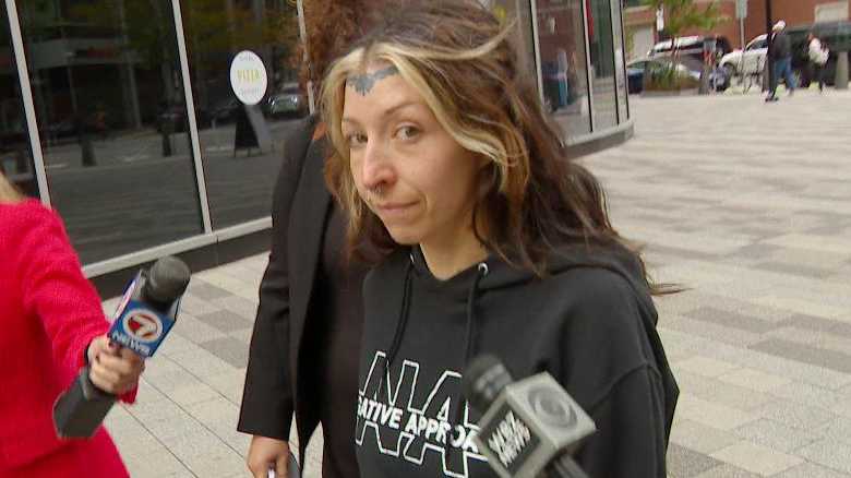 Mass. woman charged with threatening federal agents