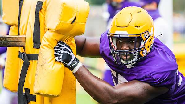 The LSU Tigers continue fall camp with another practice with shoulder pads.