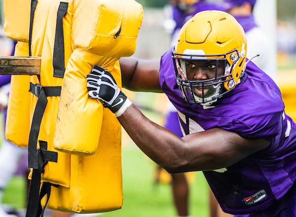 The LSU Tigers continue fall camp with another practice with shoulder pads.