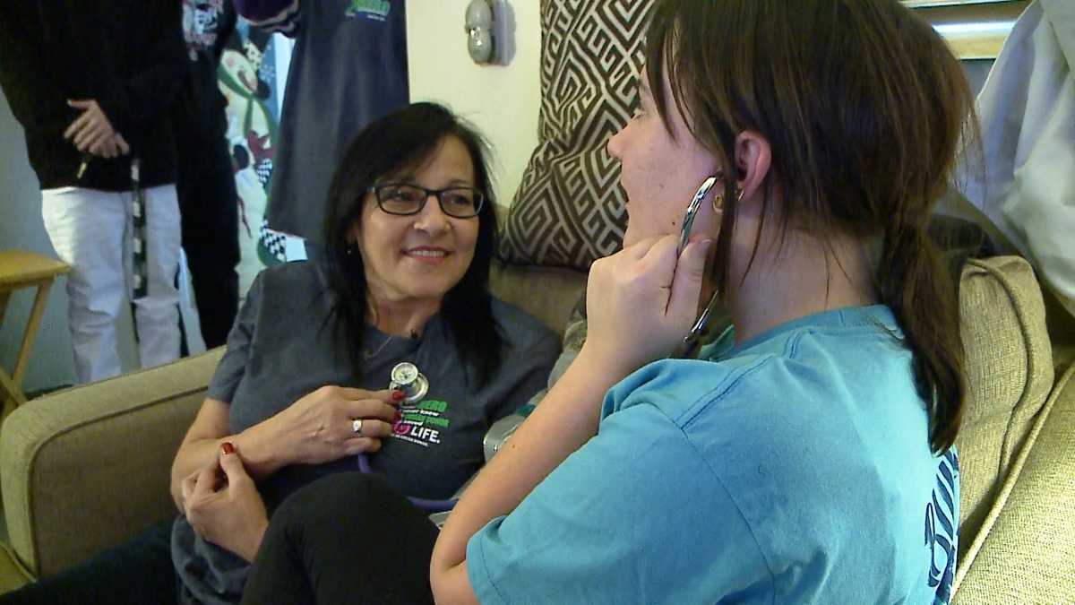 Heart recipient celebrates donor's birthday with his family