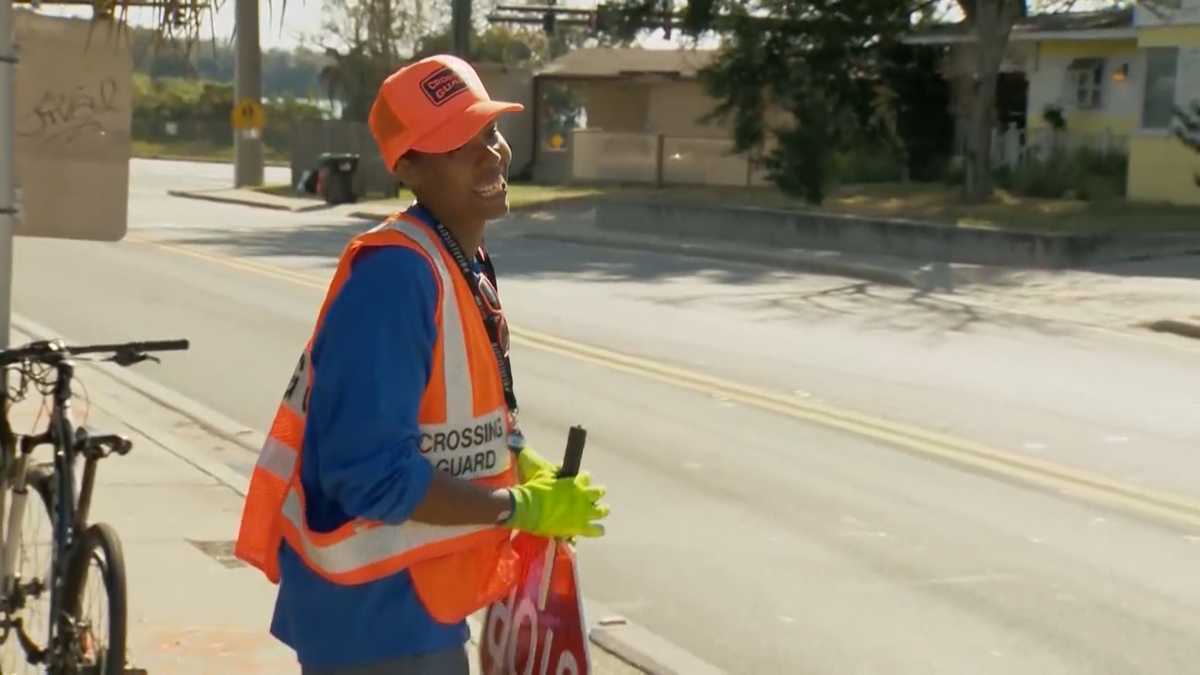 This crossing guard will make you smile!