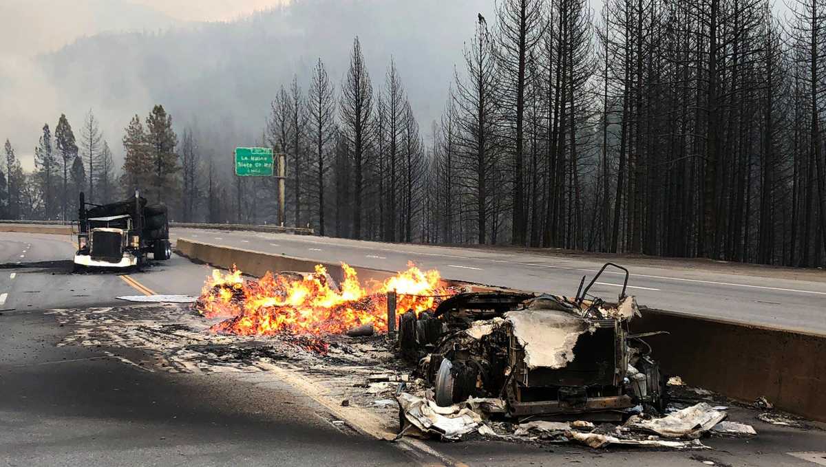 Big rigs abandoned as wildfire scorches California freeway