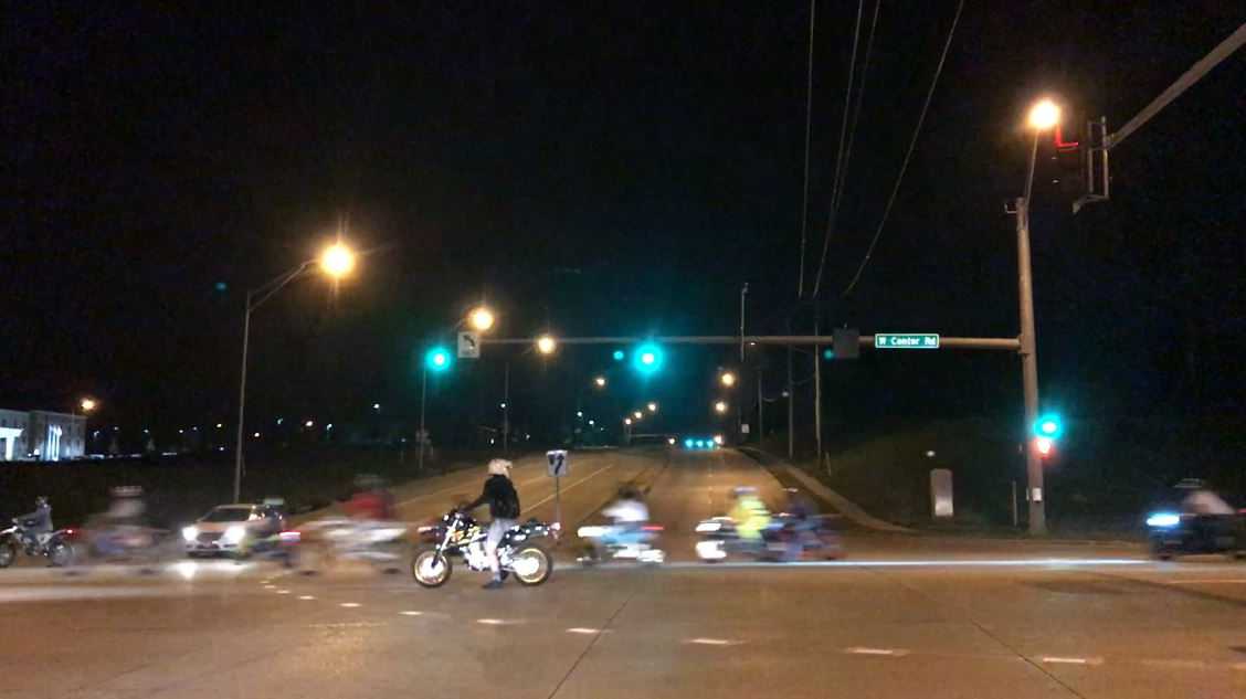 Groups of bikers block traffic, run red light at 192nd and Center