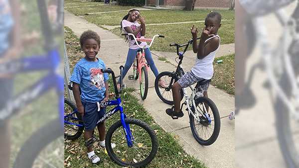 Cincinnati police officer surprises kids with new bikes
