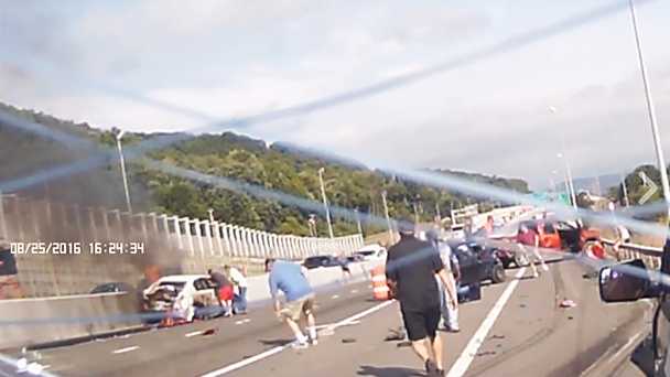 Dashcam captures dramatic highway accident, brave bystanders jump into ... Dashcam captures dramatic highway accident, brave bystanders jump into ...